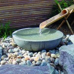 Stone ornaments, standing stones and plants for Japanese gardens