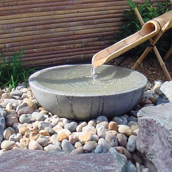Stone ornaments, standing stones and plants for Japanese gardens